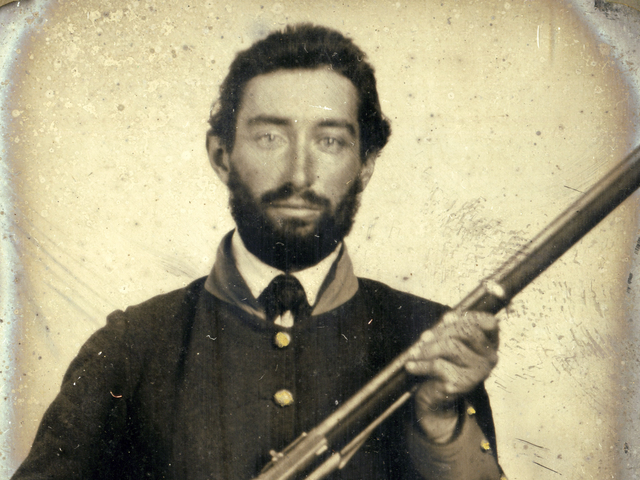 Photos of Confederate soldiers with weapons