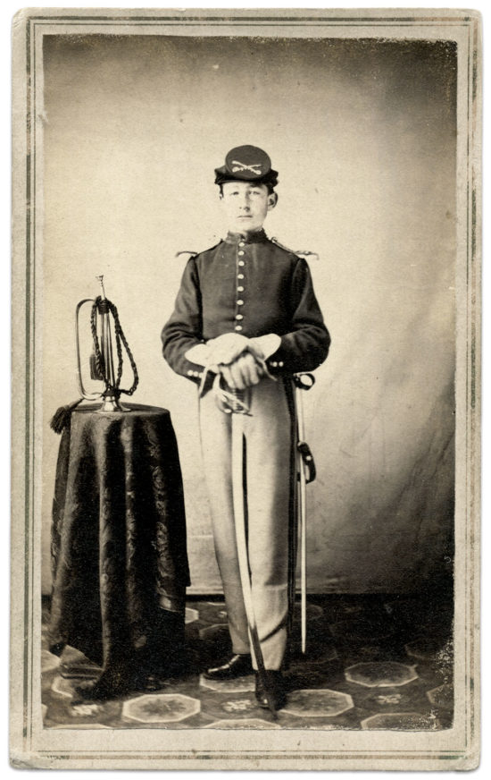 Civil War Union soldiers pictured with bugles and trumpets.