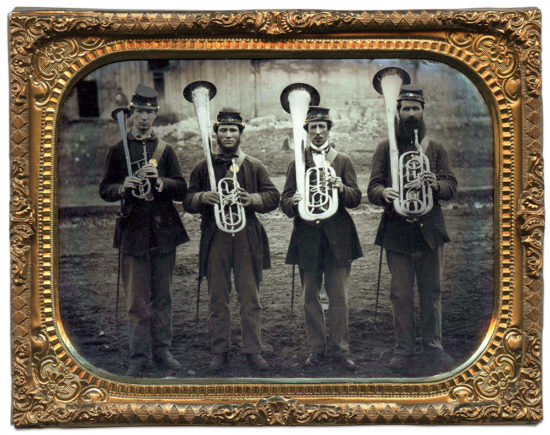 Civil War bandsmen pictured with cornets and saxhorns.