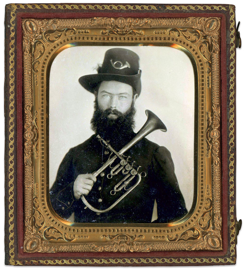 Civil War bandsmen pictured with cornets and saxhorns.